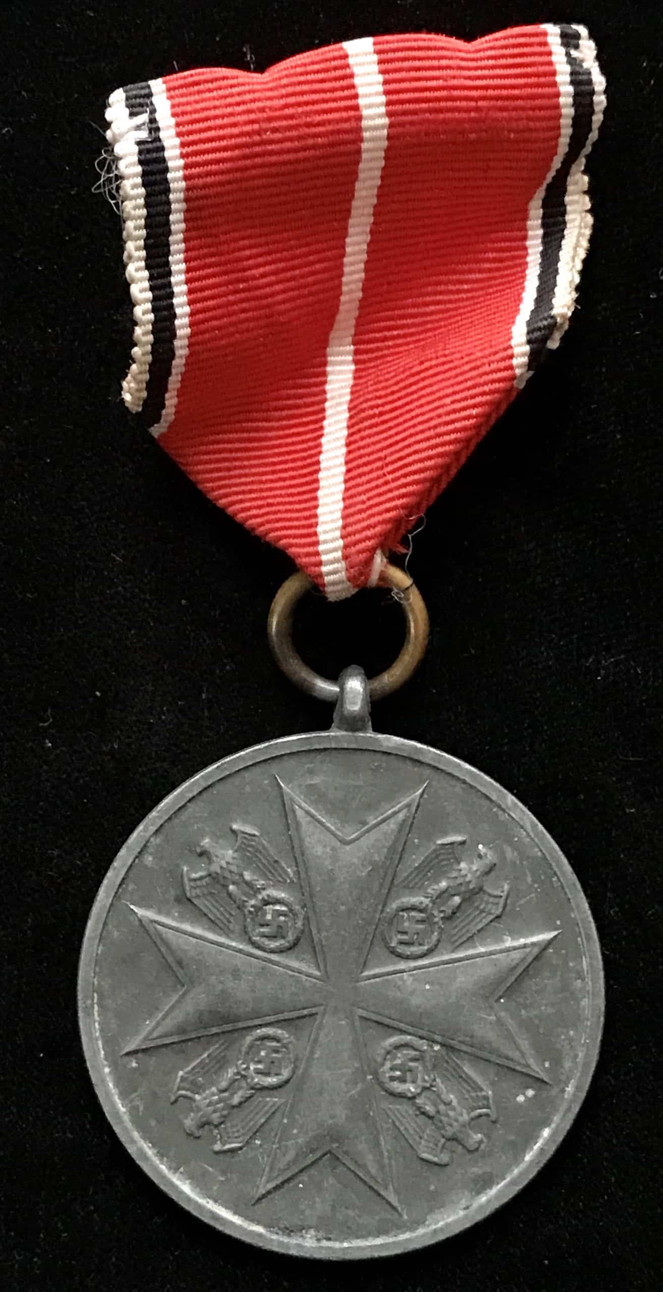 Discover Rare WWII German Eagle Medal Relic from Veteran