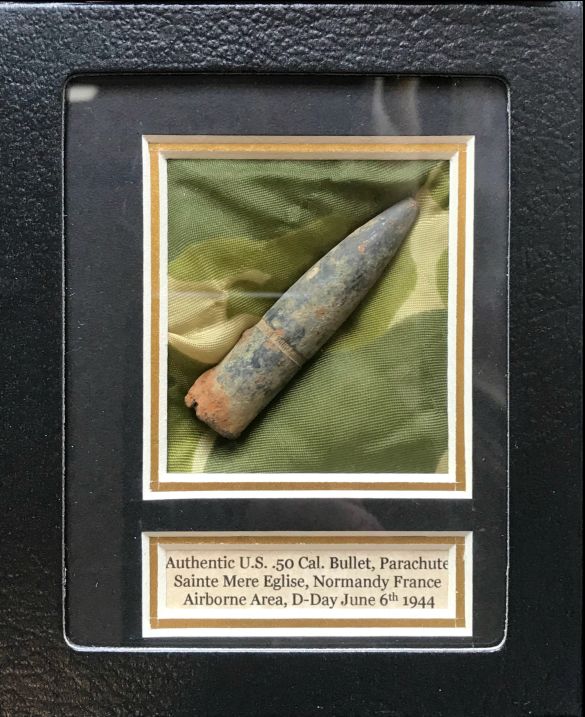 D-Day Memorabilia: Own a .50 Cal & Parachute Piece