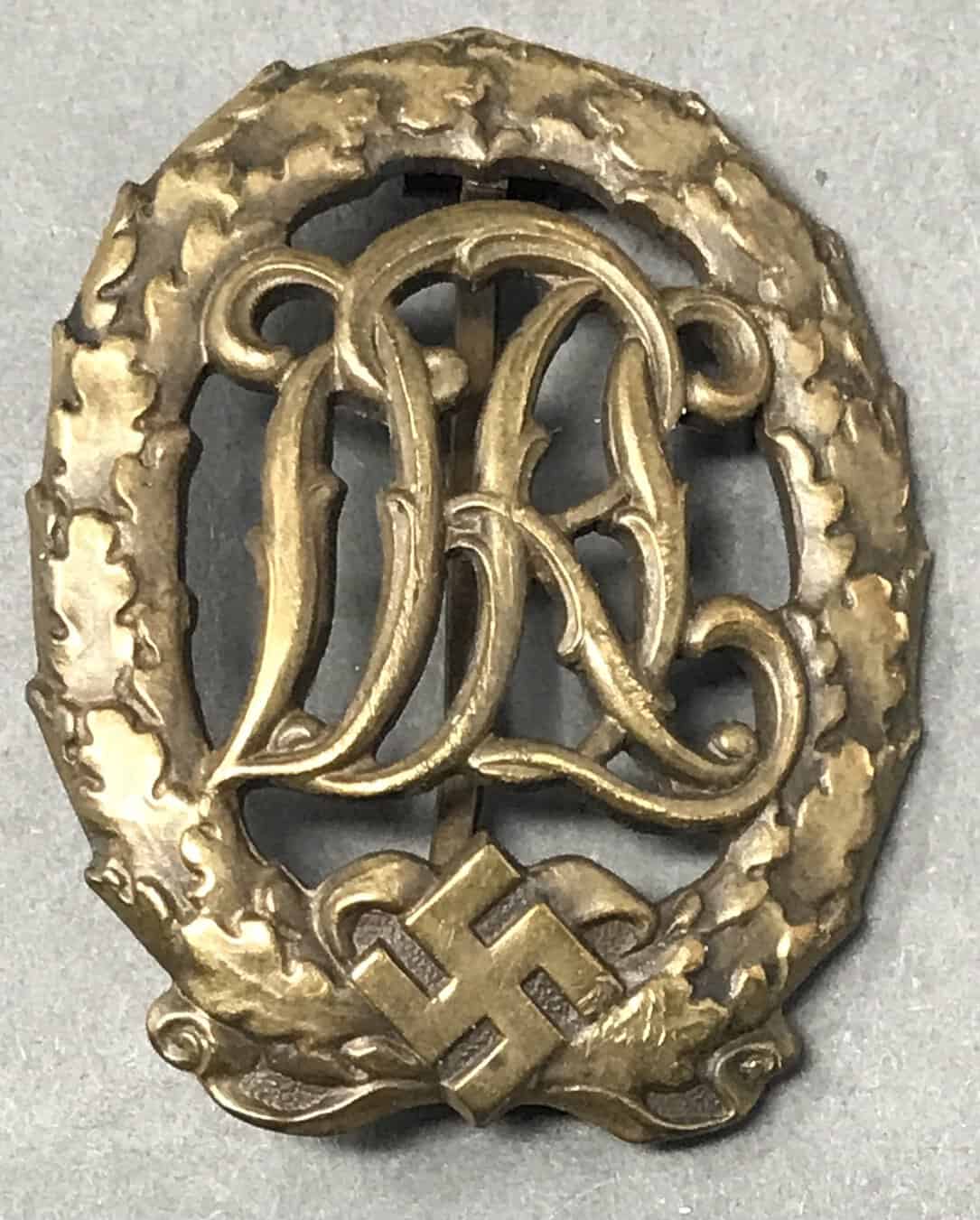 WWII Relic: NSDAP DRL Bronze Badge - A Certified Rarity