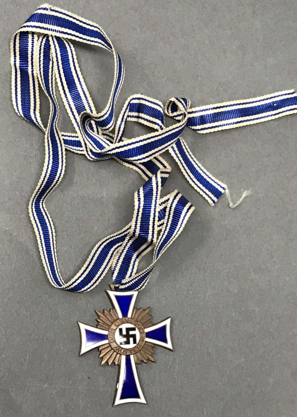 Uncover Original WWII German Mothers Cross Bronze Certified