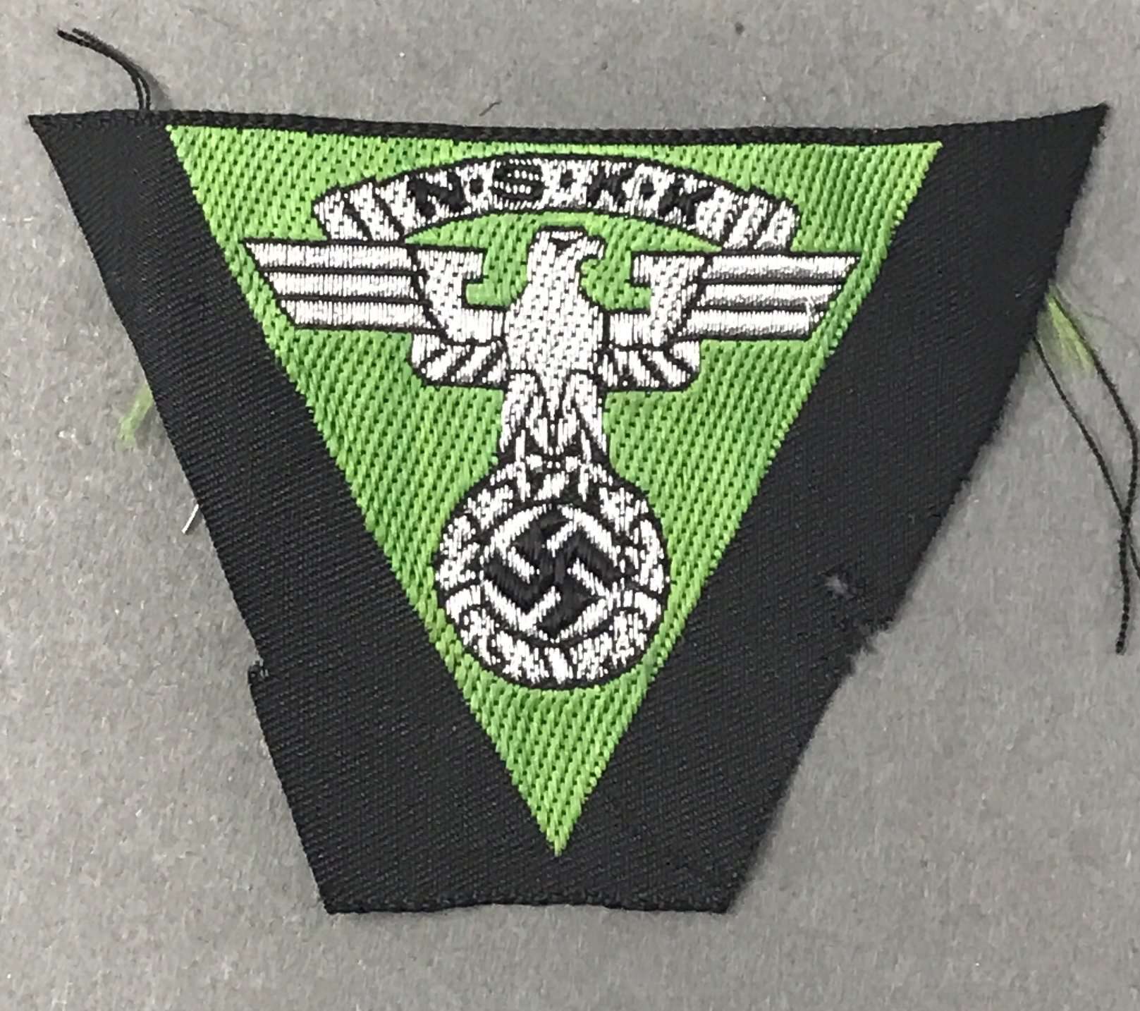 WW2 Relic Unearthed: Rare NSKK First Pattern Cap Eagle
