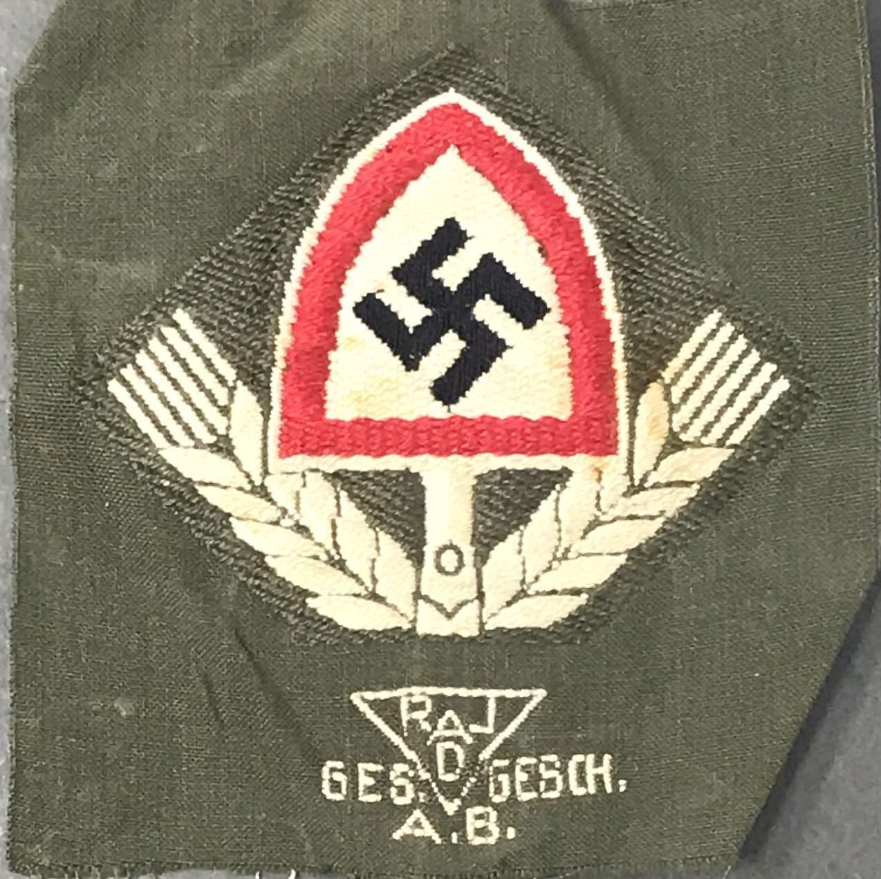 Original WWII German RAD Male’s Cap Insignia - Certified