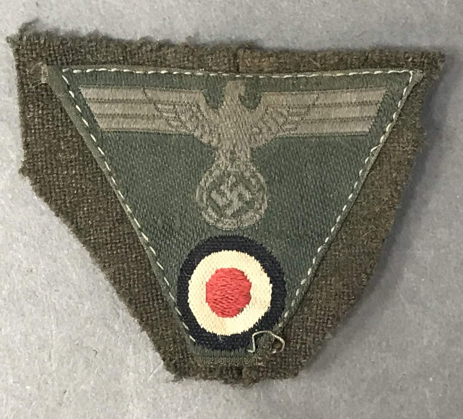 Experience Certified WWII German Cap Cut Off Insignia Relic