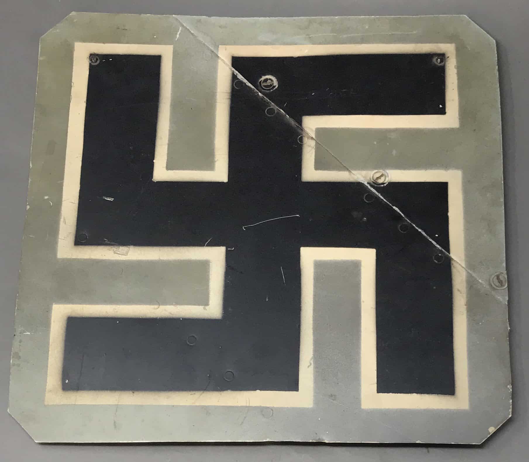 Unlock Authentic WWII ME 109 Tail with Swastika Marking