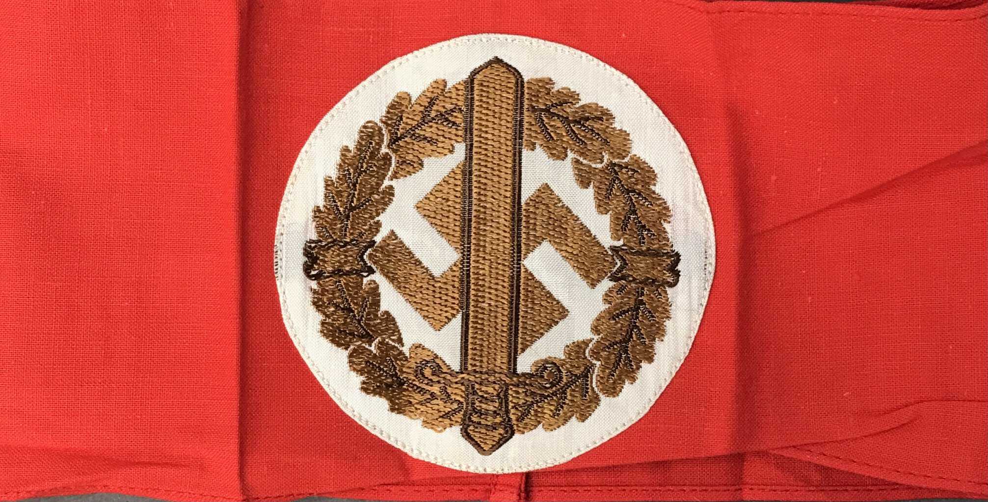 Explore Authentic WWII German SA Armband with RZM Tag