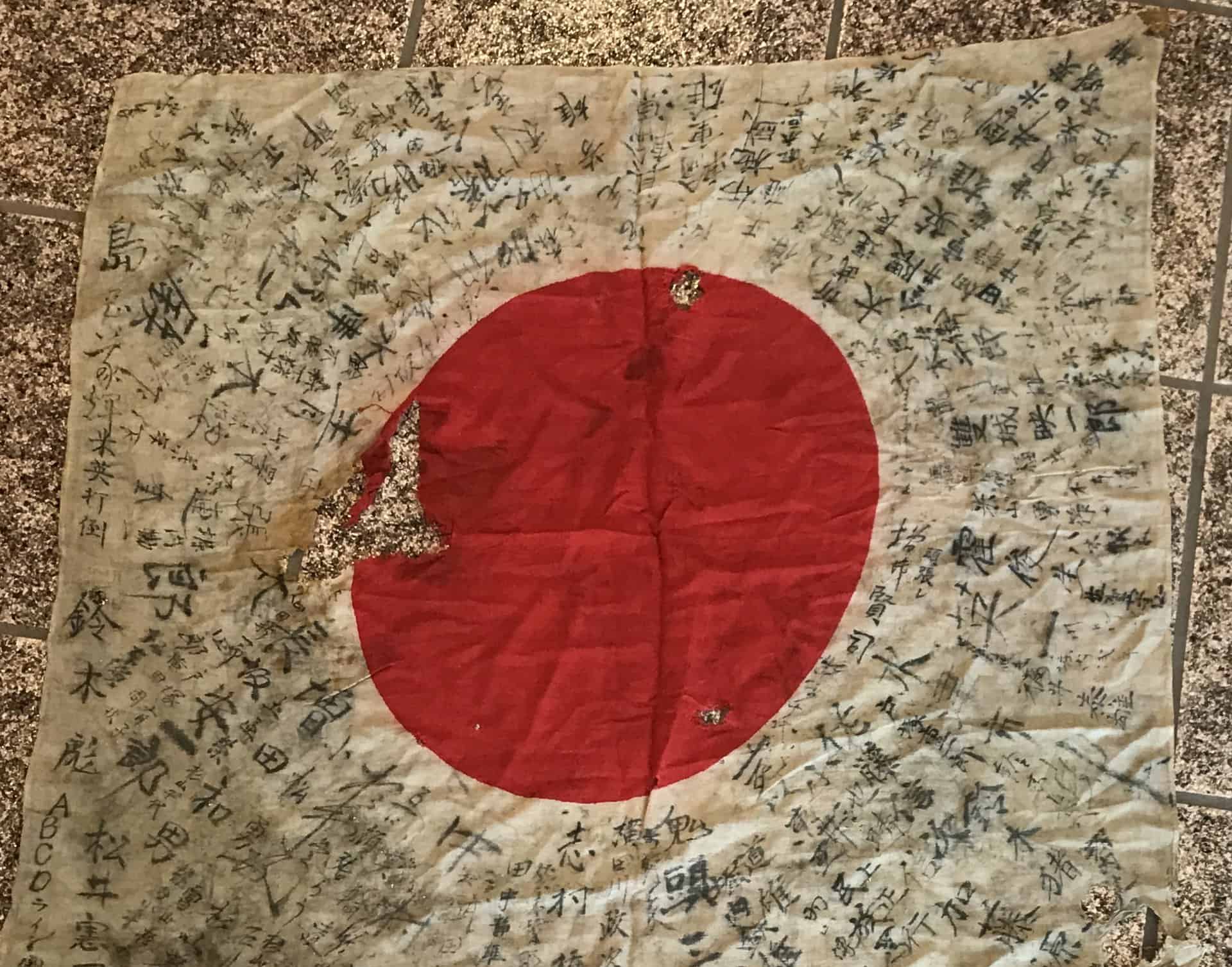 Rare WWII Japanese Blood-Stained Flag - A Must-See!