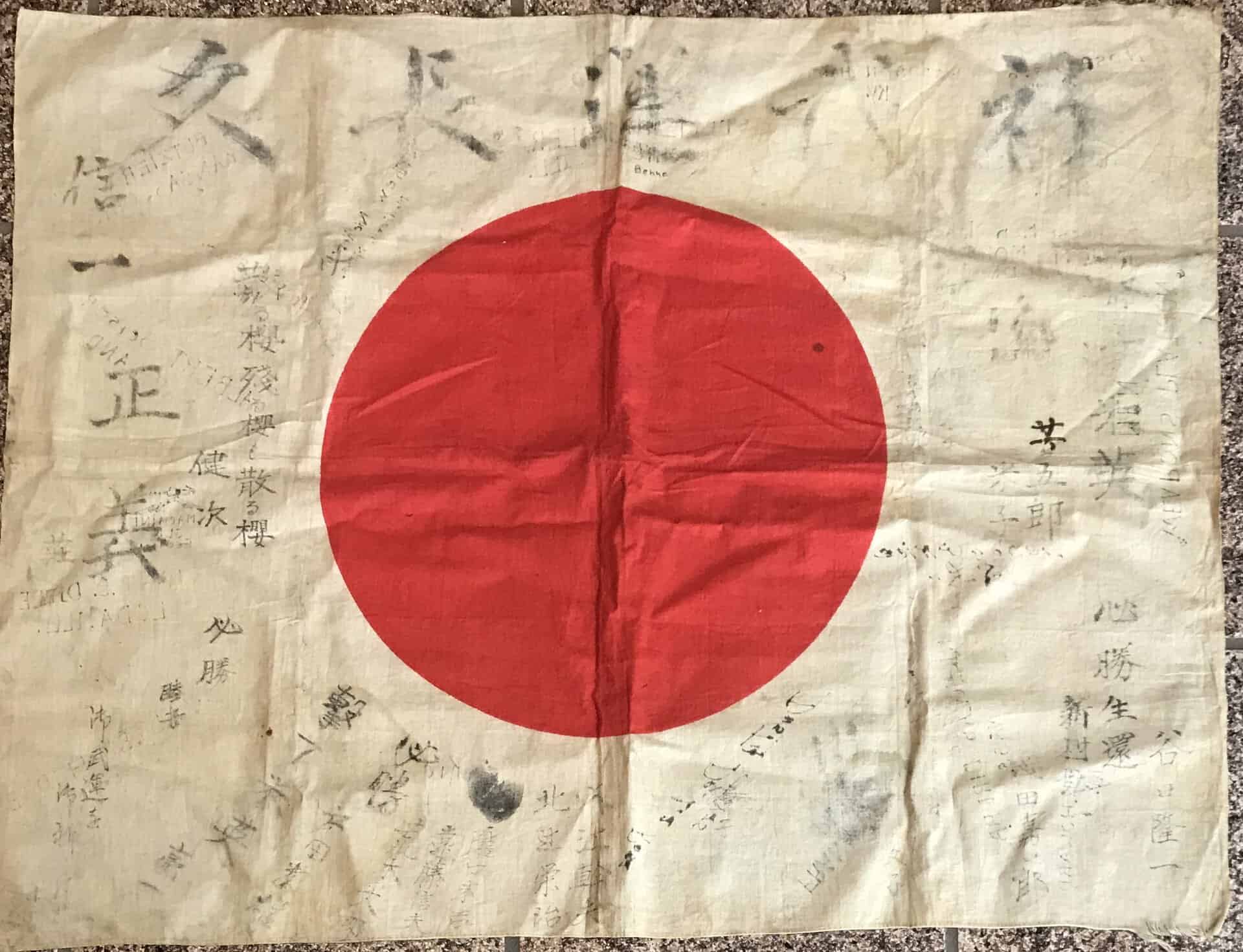 Explore Authentic WWII Japanese Flag With Veteran Signatures
