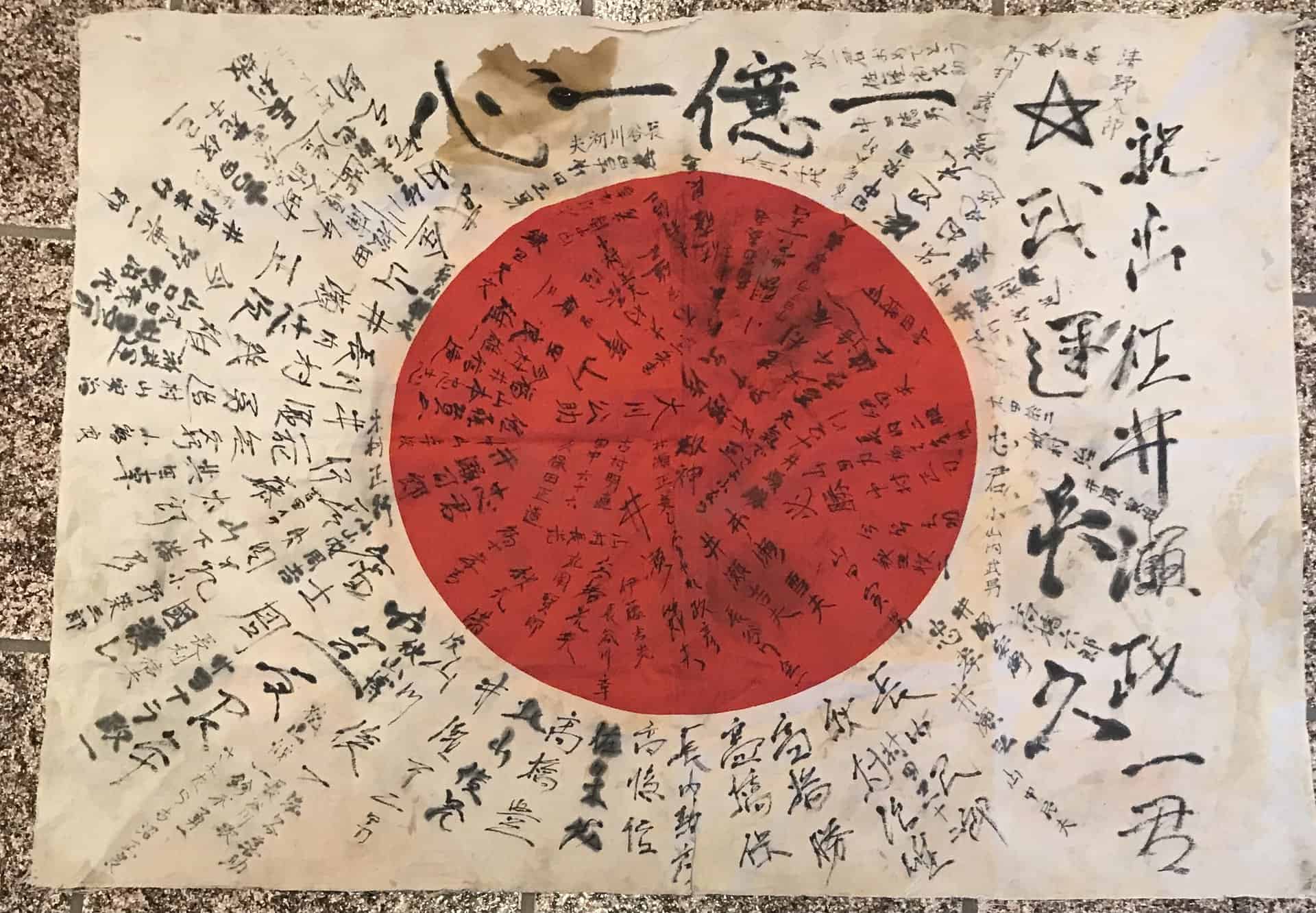 Uncover WWII Japanese Flag Blood Stained with Kanji