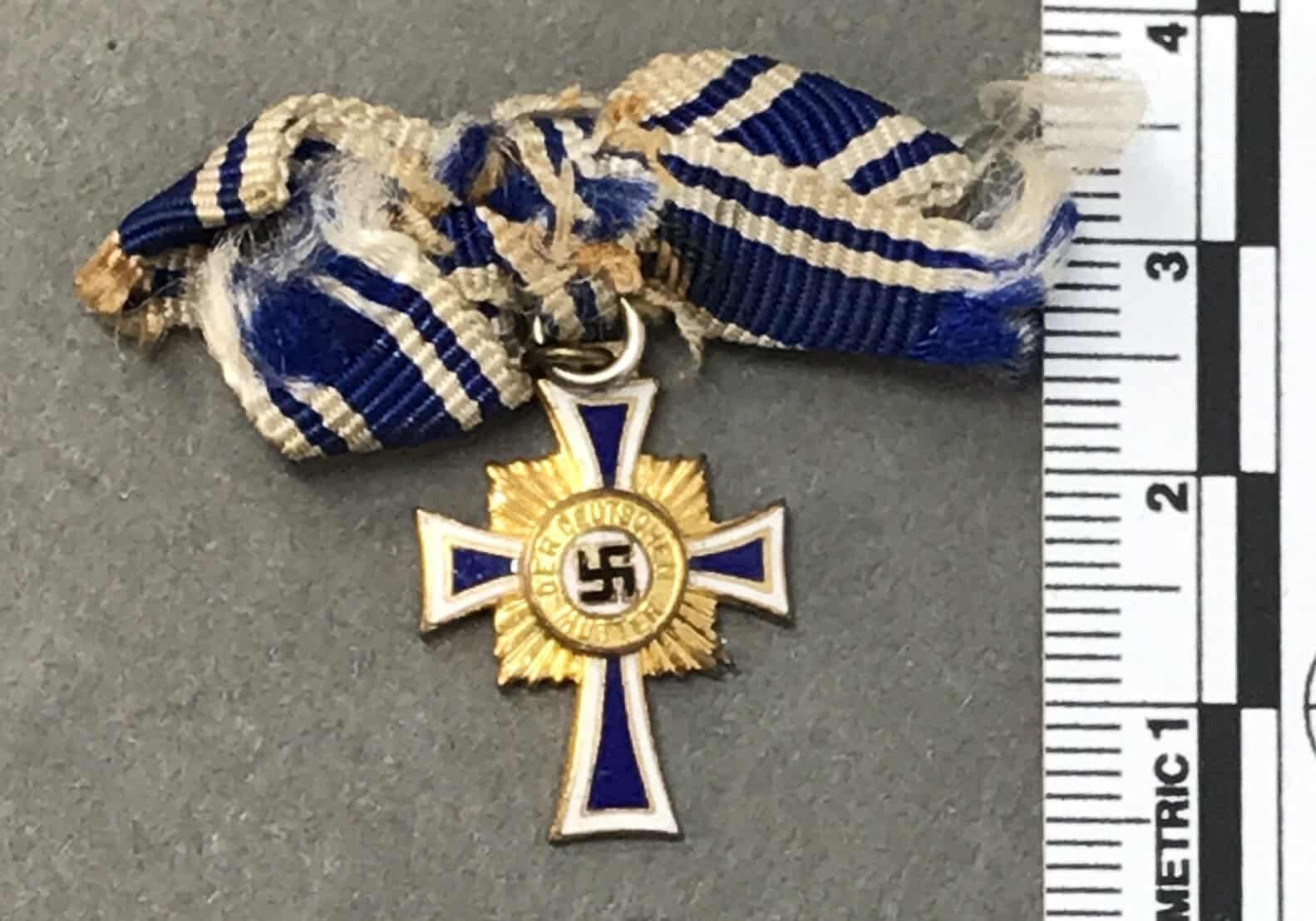 Explore Our Certified WWII German Mothers Cross Relic