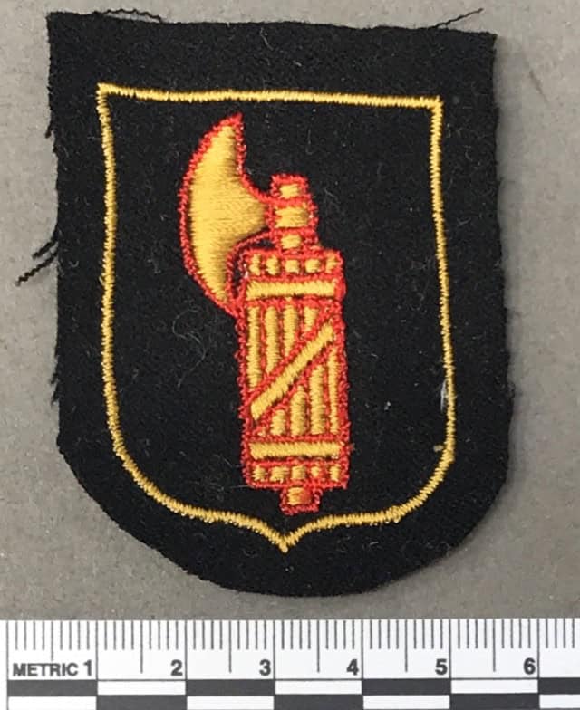 Uncover WWII German Sleeve Shield Relic | Gettysburg Museum
