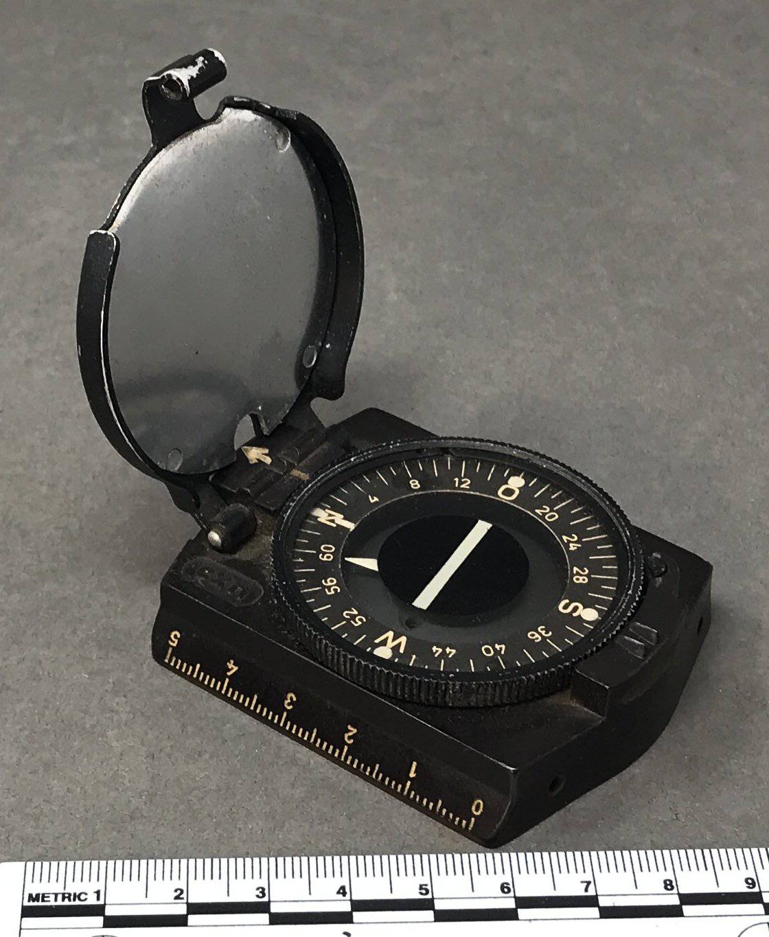 Uncover WWII German Map Dispatch Case & March Compass Relic