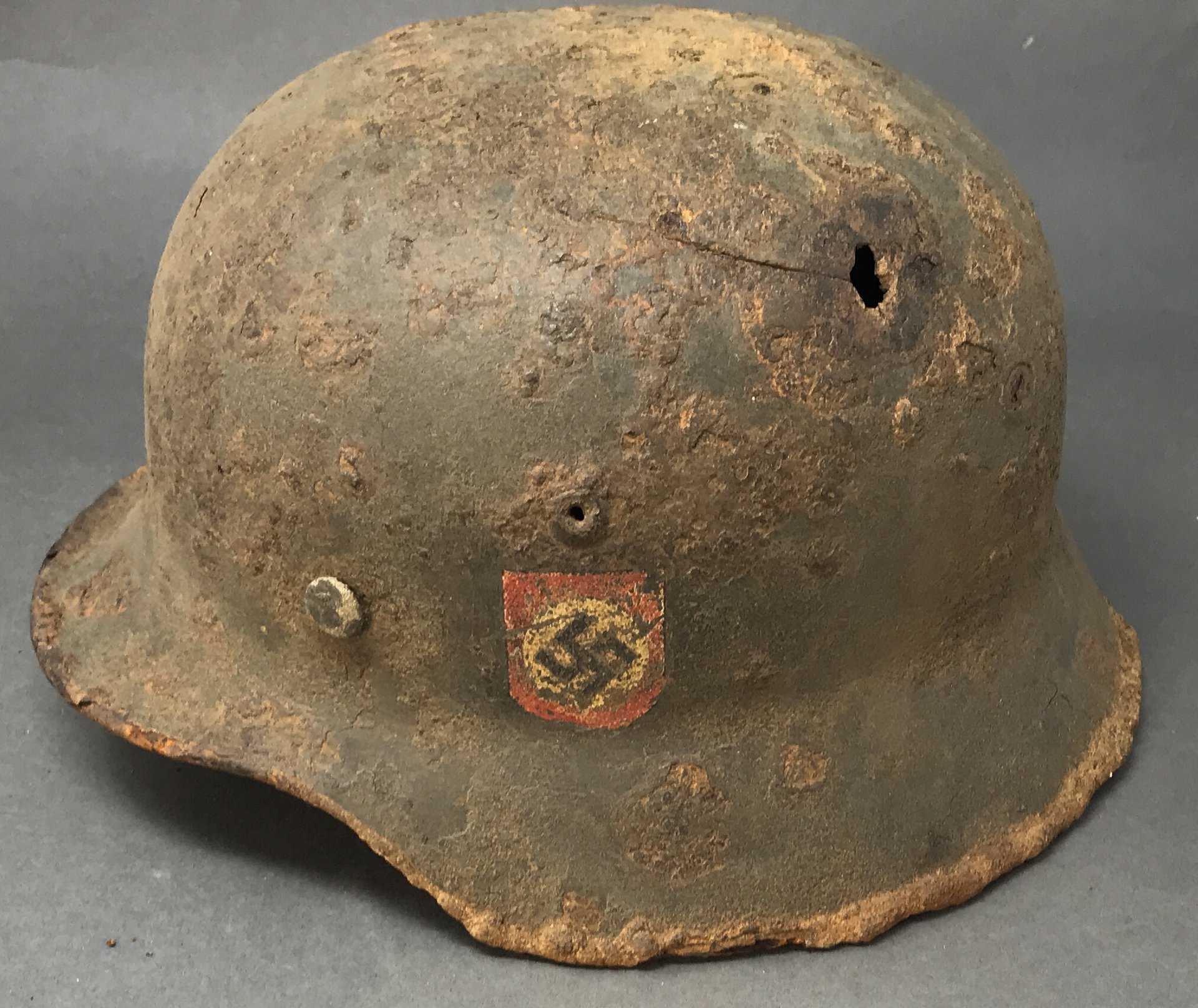 Battle-Damaged WWII Waffen-SS M35 Helmet, Eastern Front COA