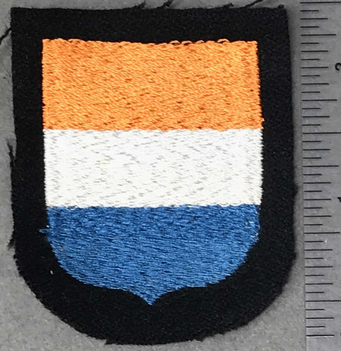 Rare WWII Dutch Waffen-SS Sleeve Shield – Authenticated