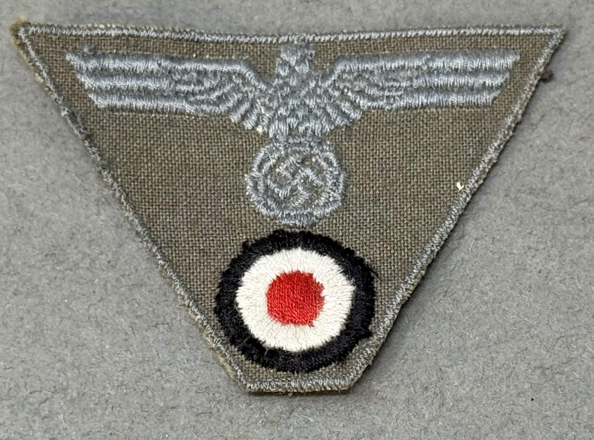 Museum-Certified WWII Heer M44 Trapezoid Cap Insignia